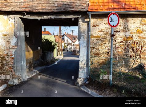 Passage Through Old Building With Traffic Sign Saying Vehicles Of