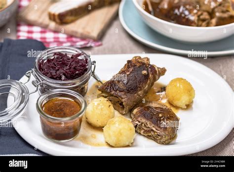 Home Style Beef Roulade With Red Cabbage And Potato Dumplings Stock