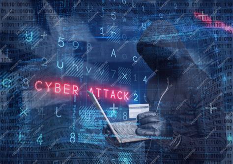 premium photo composition of binary coding and cyber attack warning text over hacker in hood