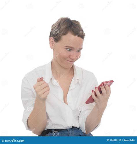 Girl Looks At The Phone And Gets Angry Annoying Call Emotional Woman Stock Image Image Of