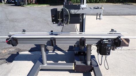 Action Packaging System Auto Top Labeler Wconveyor Wohl Associates