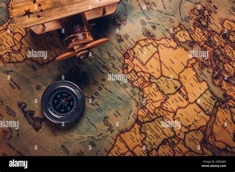 Old Compass Discovery And Wooden Plane On Vintage Paper Antique World Map Background Retro