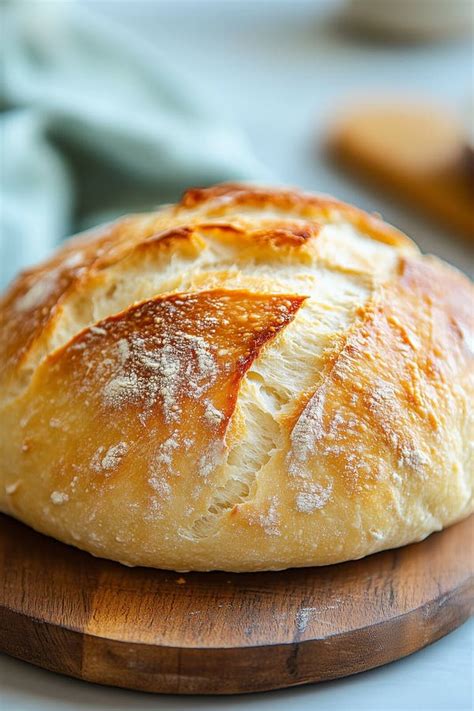 A Delicious Loaf Of Homemade Bread With A Crispy Crust And Chewy