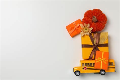 Premium Photo Fall Semester Season Concept With Babe Bus And Fall Accessories
