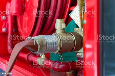 High Pressure Water Pump Valve With Fire Hose To Cabinet On The Wall