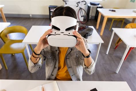 Using Vr Headset Asian Teenage Boy Exploring Virtual Reality In School