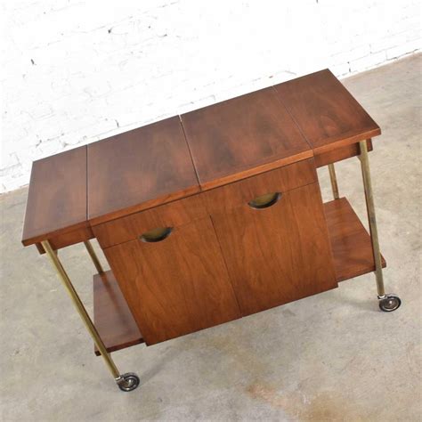 Heritage Mid Century Modern Walnut And Cane Rolling Bar Cocktail