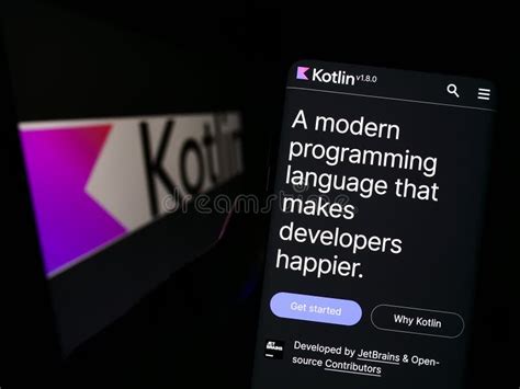 Person Holding Smartphone With Website Of Programming Language Kotlin
