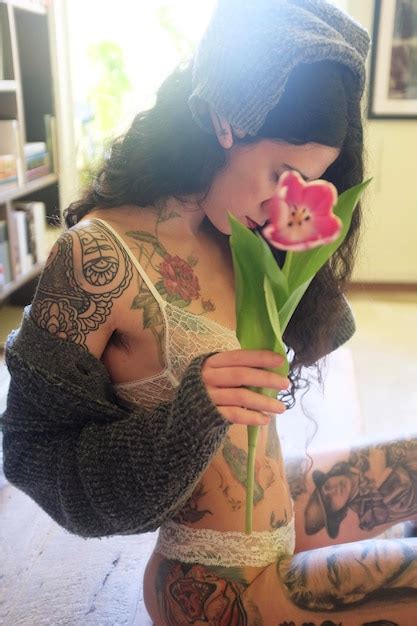 Premium Photo Woman Wearing Lingerie Holding Flower At Home