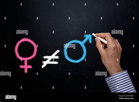Gender Inequality Concept Drawing On Chalk Board Hand Crosses Out Equals Sign Symbol Of Woman