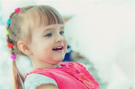 Premium Photo Close Up Of Innocent Girl Looking Away