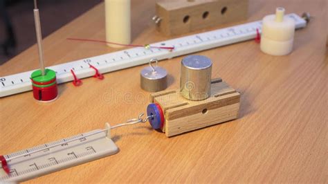 Close Up Of A Babe S Hands Moving A Physics Model Across A Table Stock Footage Video Of