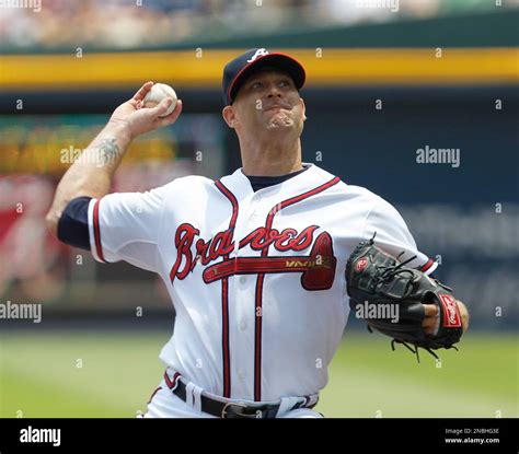 Atlanta Braves Starting Pitcher Tim Hudson Throws During The First