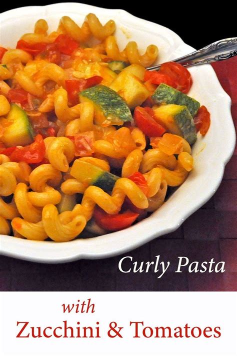 Curly Pasta With Zucchini And Tomatoes