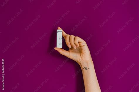 Hand Holding Positive Covid Test Antigen Rapid Test Self Test At Home Stock Photo Adobe Stock
