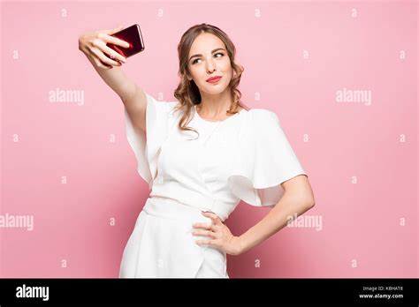 Portrait Of A Young Attractive Woman Making Selfie Photo With