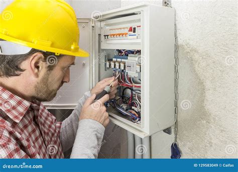 Electrician At Work On An Electrical Panel Stock Image Image Of House