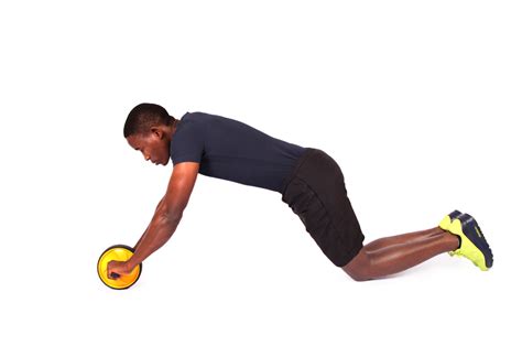 Fitness Man Doing Ab Wheel Roller Ab Exercise Kneeling High Quality