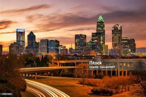 Charlotte Skyline At Sunset With Light Trails And Beautiful Cloudscape