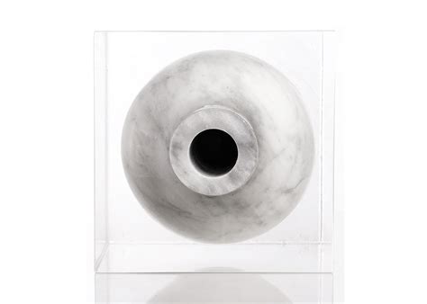 Moreno Ratti Suspends Marble Volumes Inside Resin Cubes