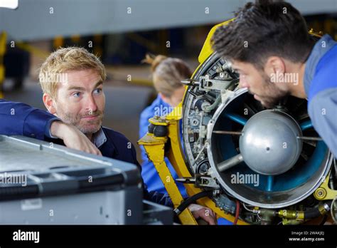Apprentices Aeronautical Engineers Learning With Their Professor Stock