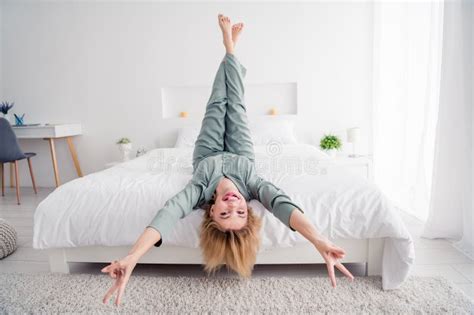 Full Body Length Photo Lying Body Down Legs Up Lady In Pajama Loves Her New Comfortable Bed