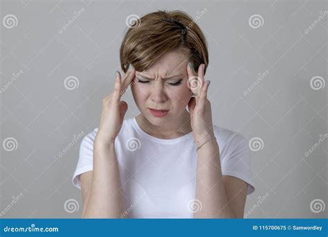 Human Expressions And Emotions Young Attractive Woman With Headache