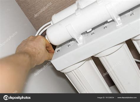 Installation Of Reverse Osmosis Water Purification System Stock Photo Dmitrimaruta 161336034
