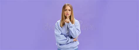 Girl Concerned Someone Know Secret Making Shush Gesture With Index
