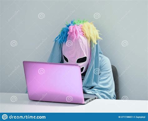 Anonymous Hacker With Crazy And Weird Fashion Concept Of Hacking Cybersecurity Cybercrime