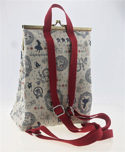 Alice In Wonderland Kiss Lock Backpack Metal Frame Clasp Opening With