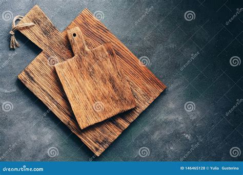 Two Rustic Wooden Cutting Board On A Gray Background Top View Flat