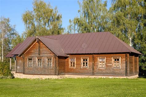 Old Traditional Russian Wooden House Izba On A Sunny Summer Day Stock