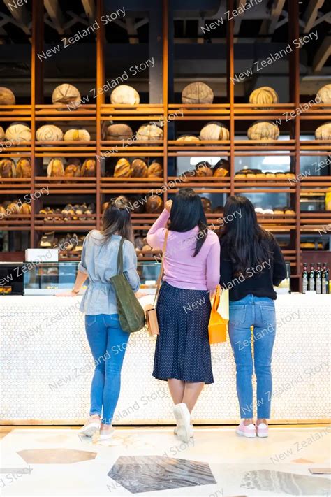 New Zealand Story Toolkit Young Women At Bakery Counter