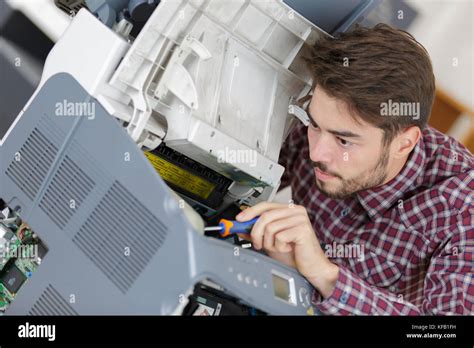 Fixing A Printer Stock Photo Alamy