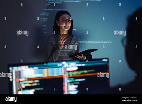 Asian Woman Developer Presentation About Coding Software Data With