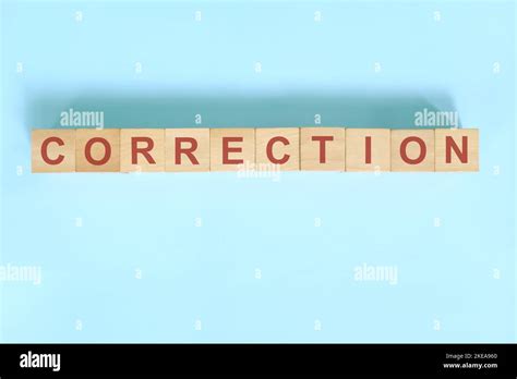 correction business problem solving concept wooden blocks crossword