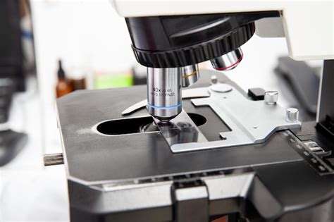 Premium Photo Microscope Slide With Pap Smear Sample On The