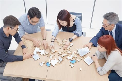 Premium Photo Company Employees Playing Game And Joining Pieces Of