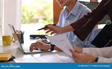 Image Of Developer Team Collaborating On Mobile Application Software Design Project Together At