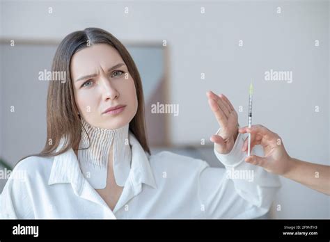 Young Beautiful Woman Visiting Beauty Center And Rejectong Botox Young Beautiful Woman Visiting Beauty Center And Rejectong Botox