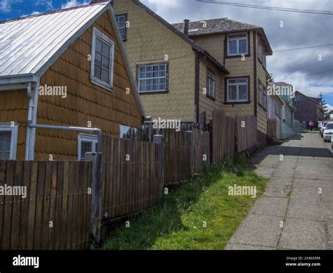 Architectural Detail Of Typical Wooden Shingle Cladding On Houses In