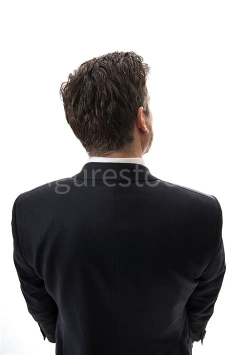 Figurestock A Mystery Man In A Suit From Behind Shot From Above