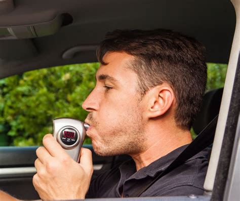 Should All New Cars Include Alcohol Detection Systems Causes Take