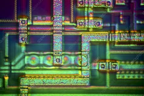Microchip Surface Light Micrograph Stock Image C028 8676 Science Photo Library