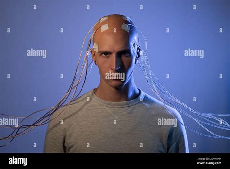 Man With Electrodes In His Head Is A Futuristic Concept Of Virtual Reality And Mind Control