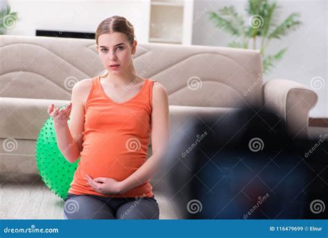 The Pregnant Woman Recording Video For Blog And Vlog Stock Image
