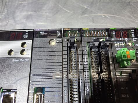 OMRON CJ H CPU EIP PROGRAMMABLE LOGIC CONTROLLER WITH CARDS SEE PICS EBay