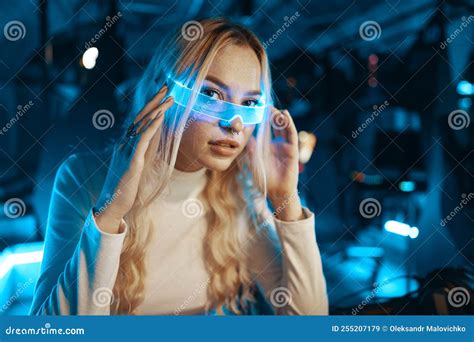 Cute Blonde In Futuristic Fashion Style Neon Glasses For A Young Woman
