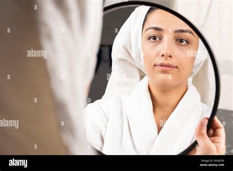 Beautiful Woman Looking Mirror After Shower Her Hair Wrapped In Towel
